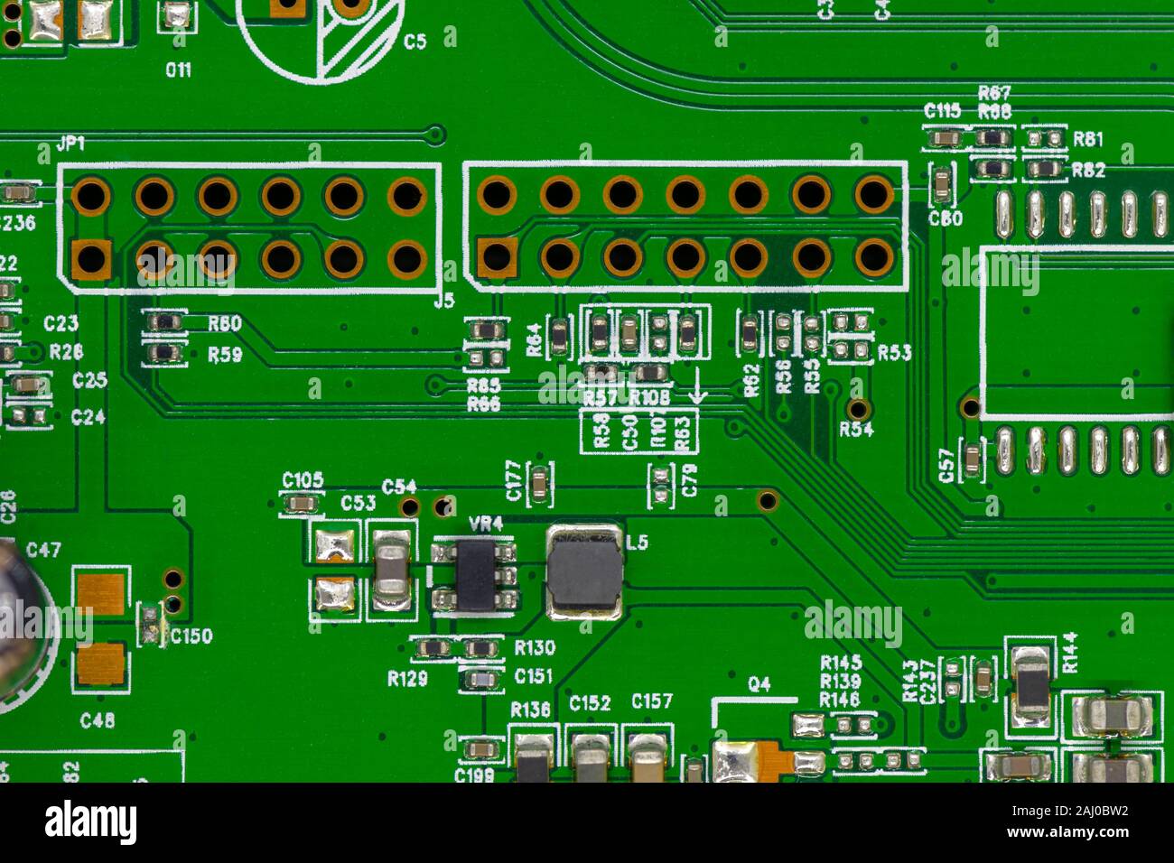 Green electronic circuit board background with visible white numbers ...