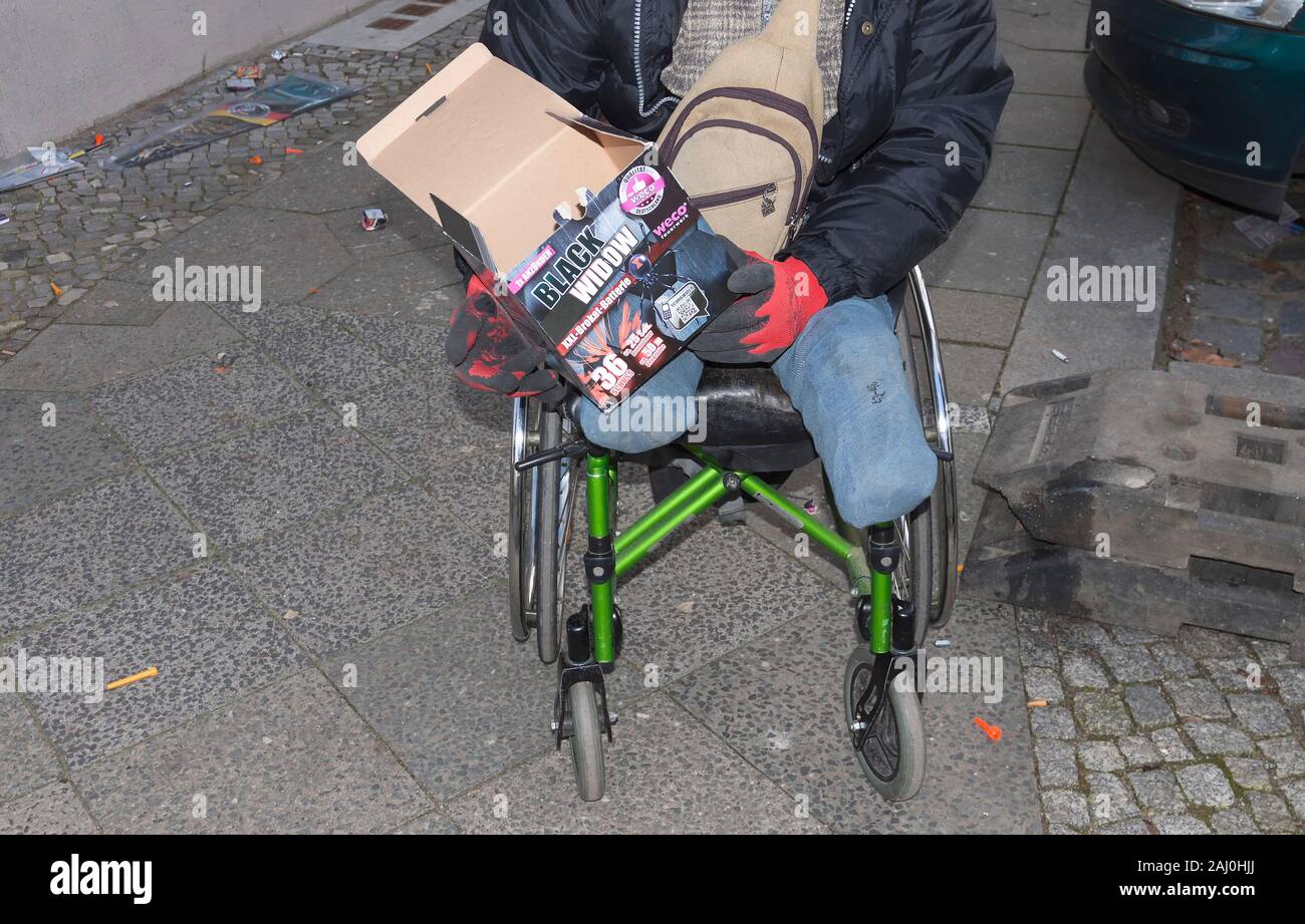 Man in a wheelchair who lost his feet in an explosion 2 years ago Stock ...
