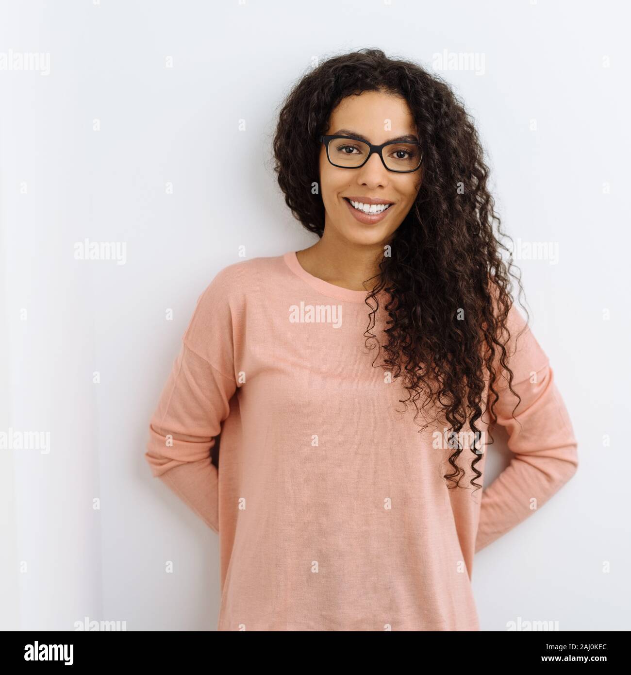 African american looking over wall hi-res stock photography and images ...