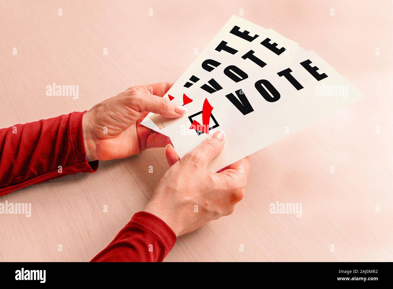Voting hands ballot box hi-res stock photography and images - Alamy