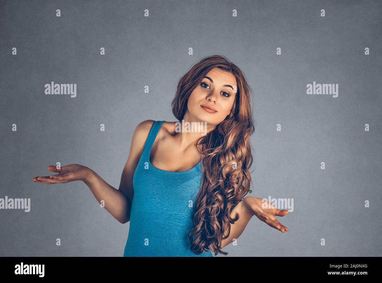 Girl pointing in two directions hi-res stock photography and images - Alamy