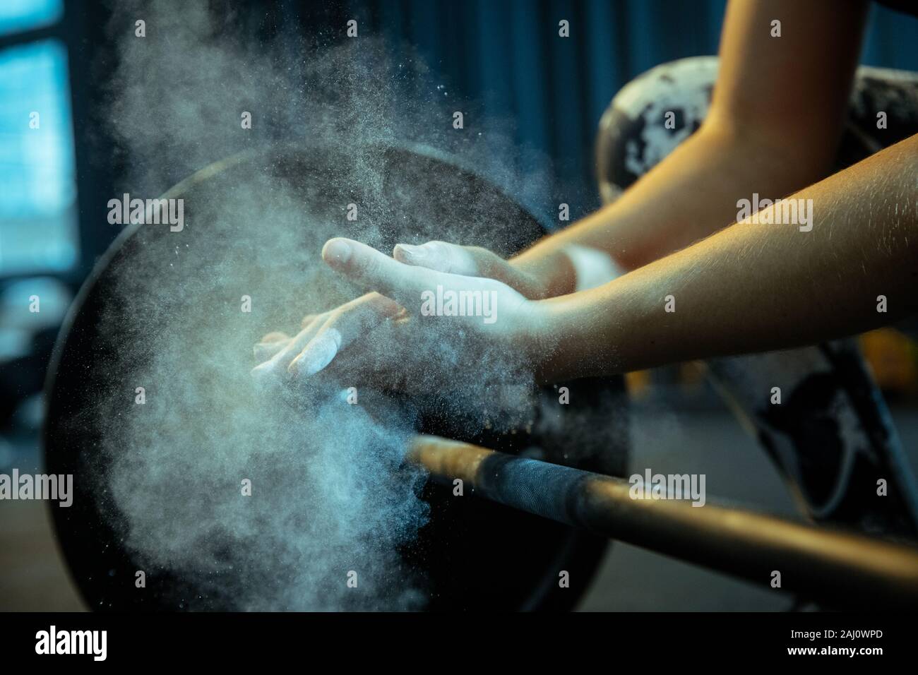 Caucasian teenage girl practicing in weightlifting in gym. Female ...