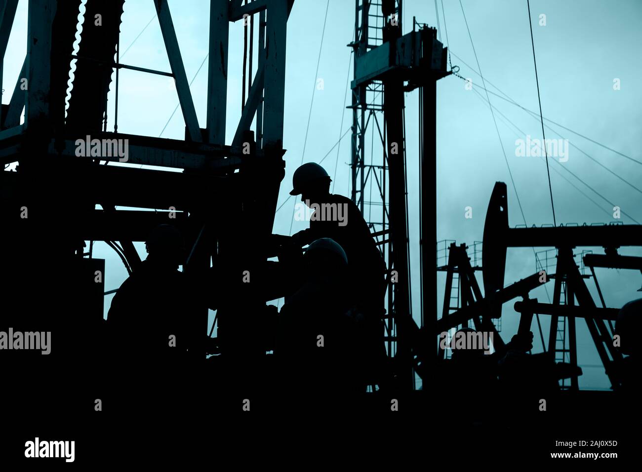 oil field, the oil workers are working Stock Photo - Alamy