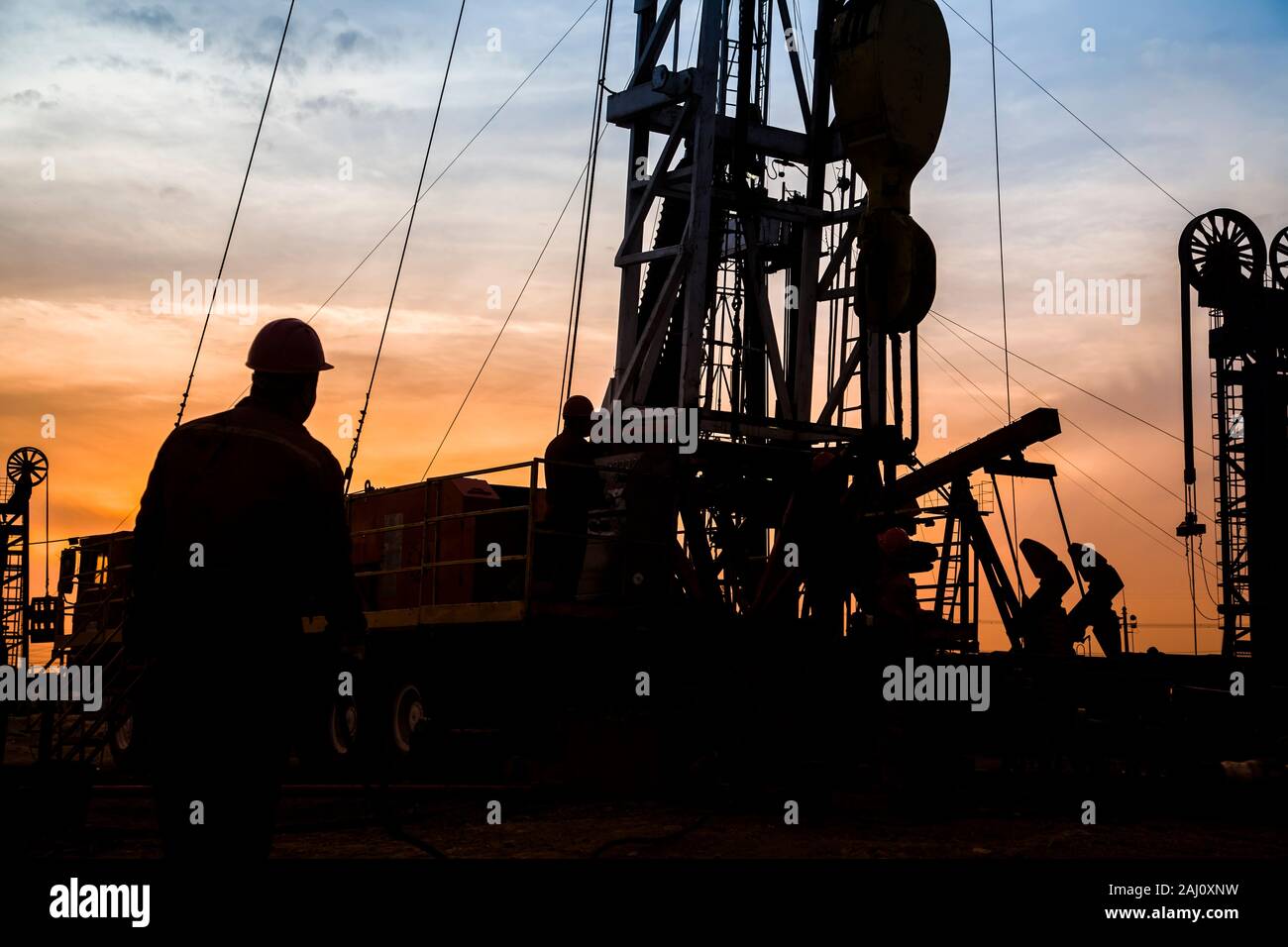 oil field, the oil workers are working Stock Photo - Alamy