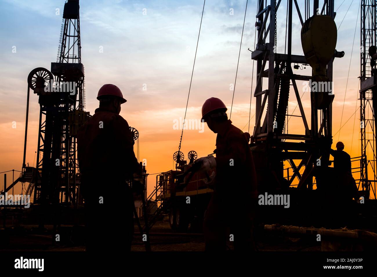 oil field, the oil workers are working Stock Photo - Alamy