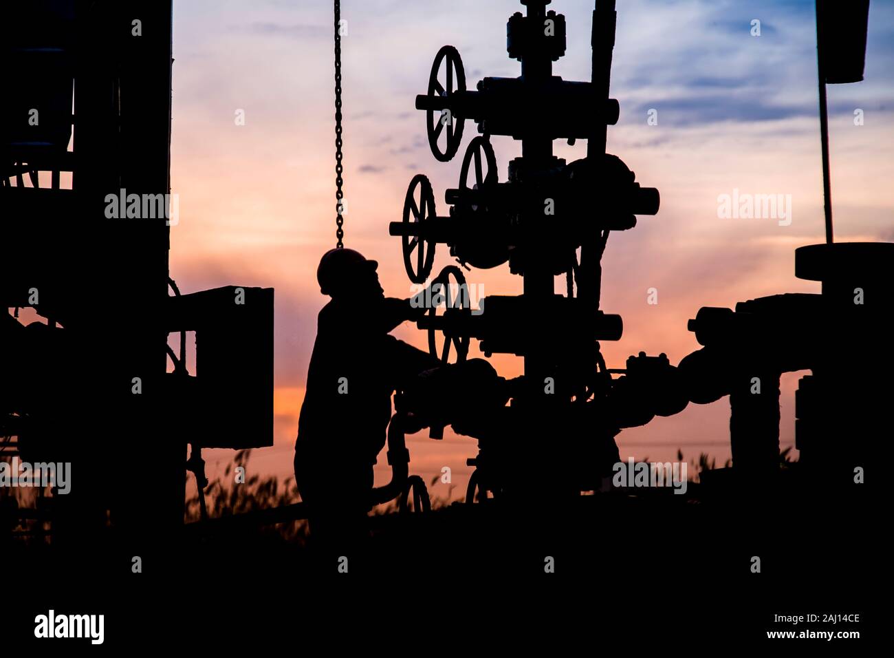 oil field, the oil workers are working Stock Photo - Alamy