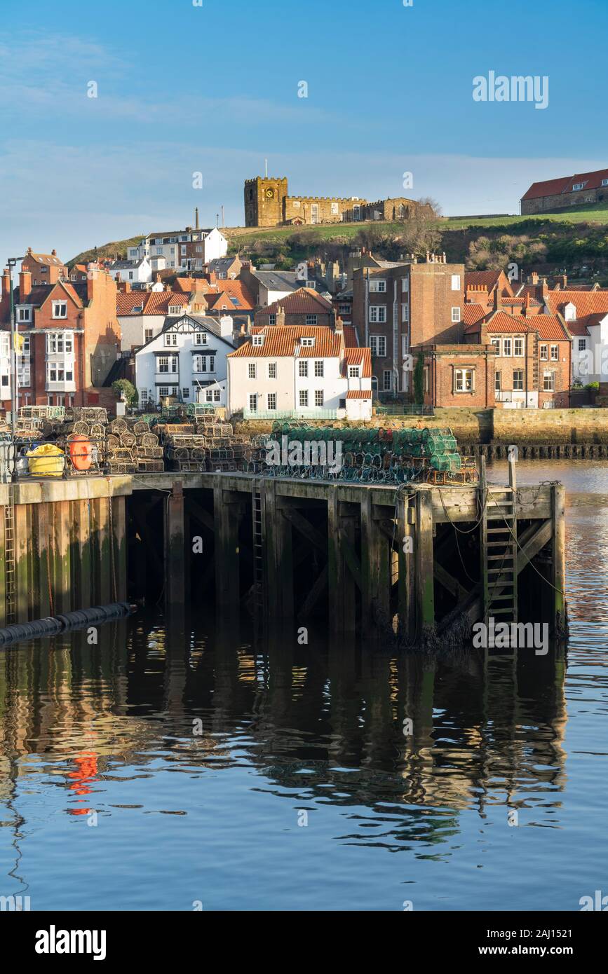 St Mary's Church on the cliff top overlooking Whitby harbour and the ...