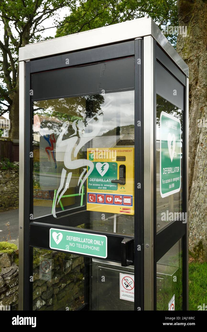 An emergency defibrillator inside a former BT phone box in the village ...