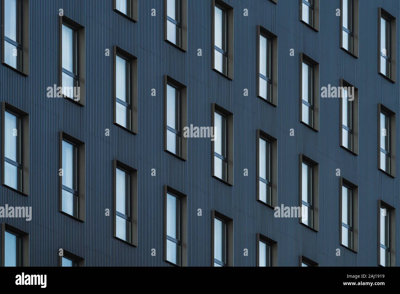 Rows of windows of a residential building Stock Photo - Alamy