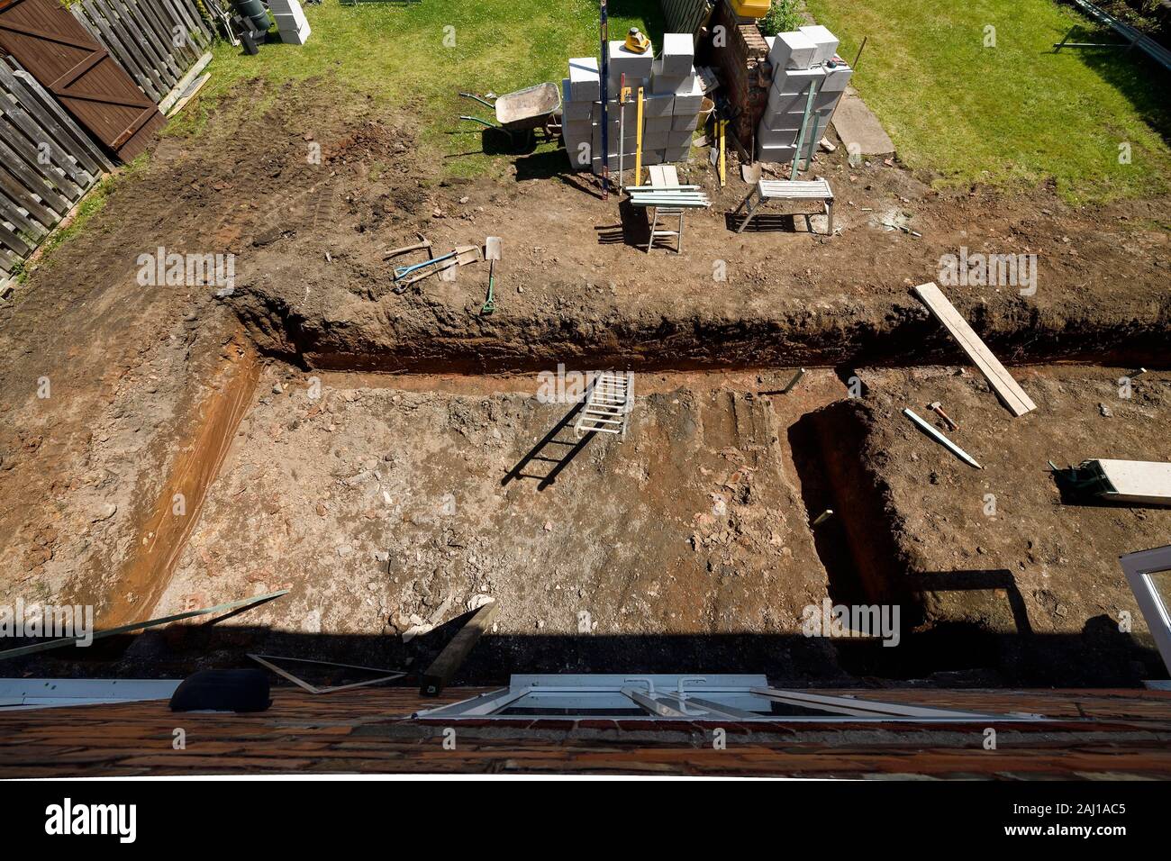 The dug foundation trench for a rear extension project at a house in ...