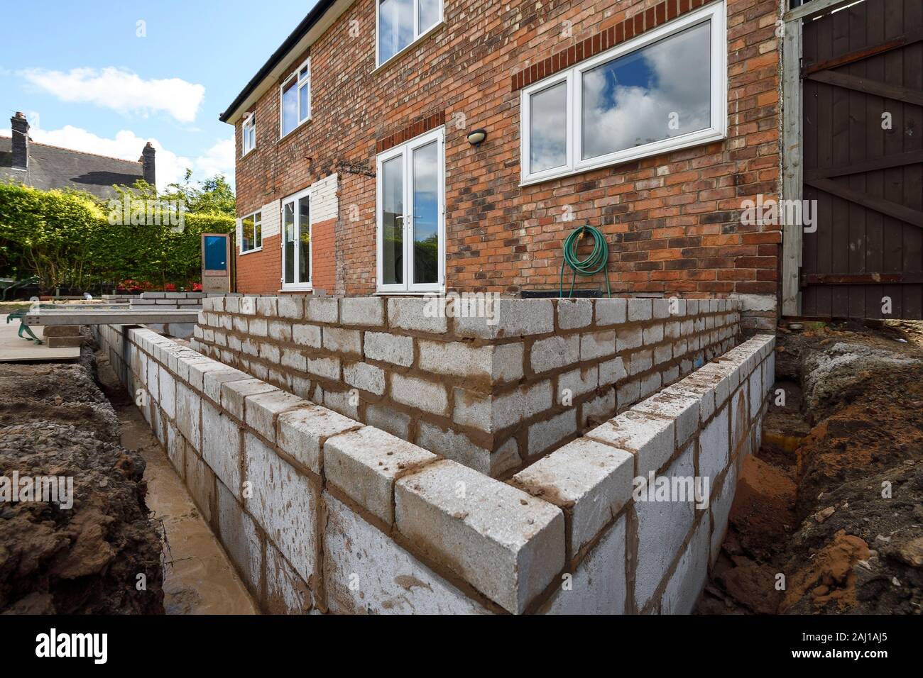 The first few rows of bricks for an extension project at a house in ...