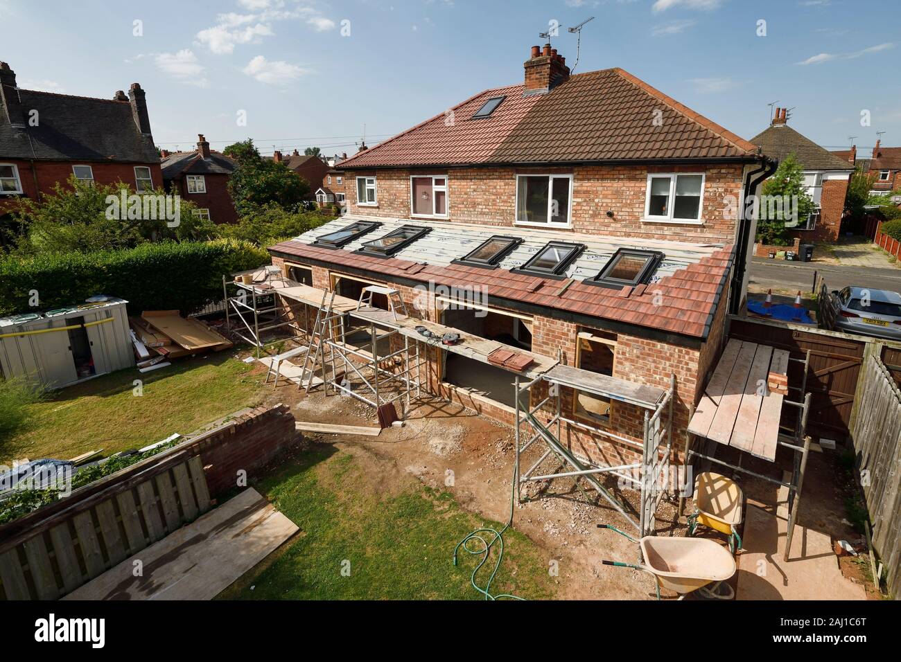 An elevated view of a partially built rear extension project at a house ...