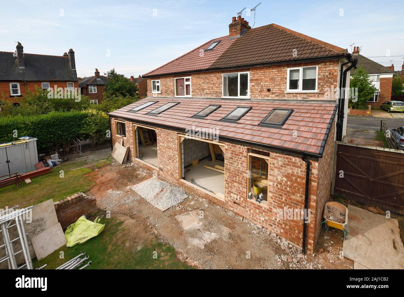 An elevated view of a partially built rear extension project at a house ...
