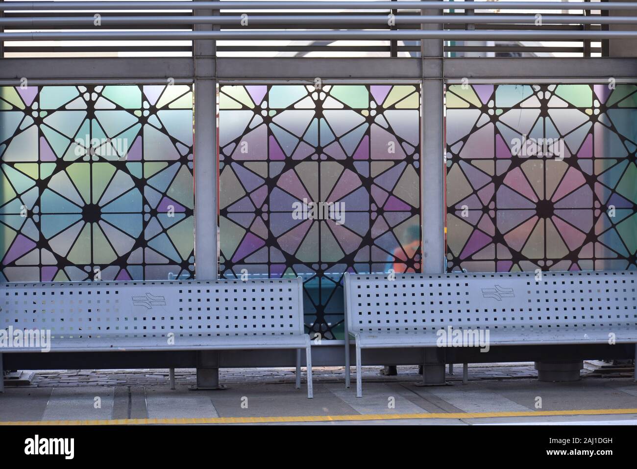 Stained Glass Behind Two Benches at the BInyamina Train Station in ...