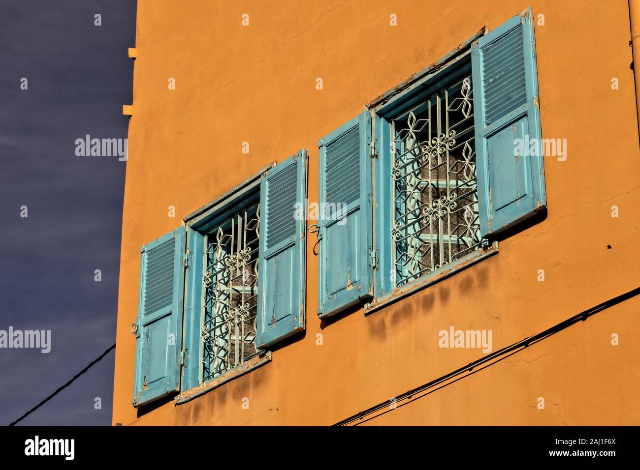 Windows with blue shutters in an arabic house in Tiznit, Morocco Stock ...