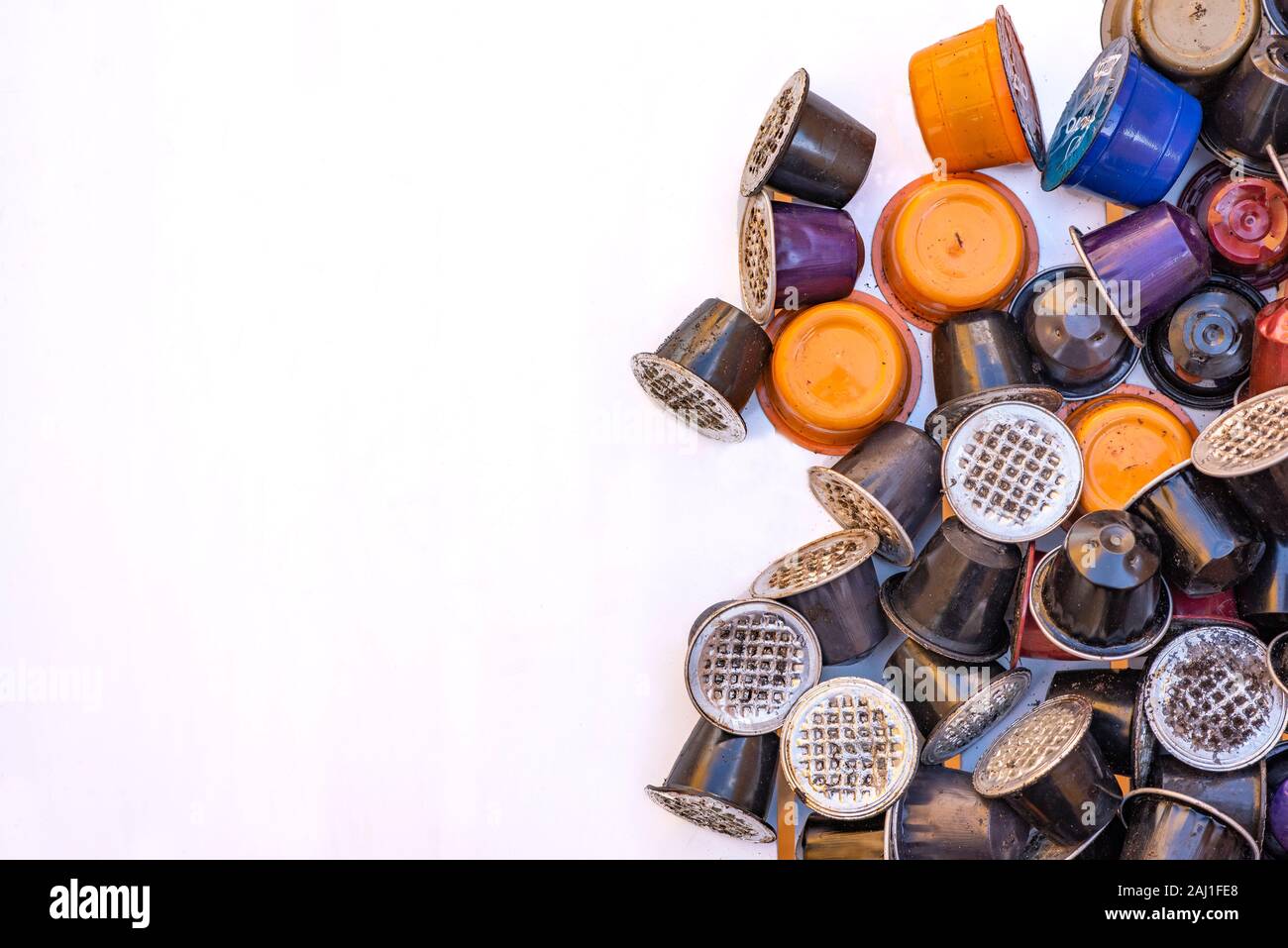 Used coffee capsules of various colors and flavors. These capsules are ...