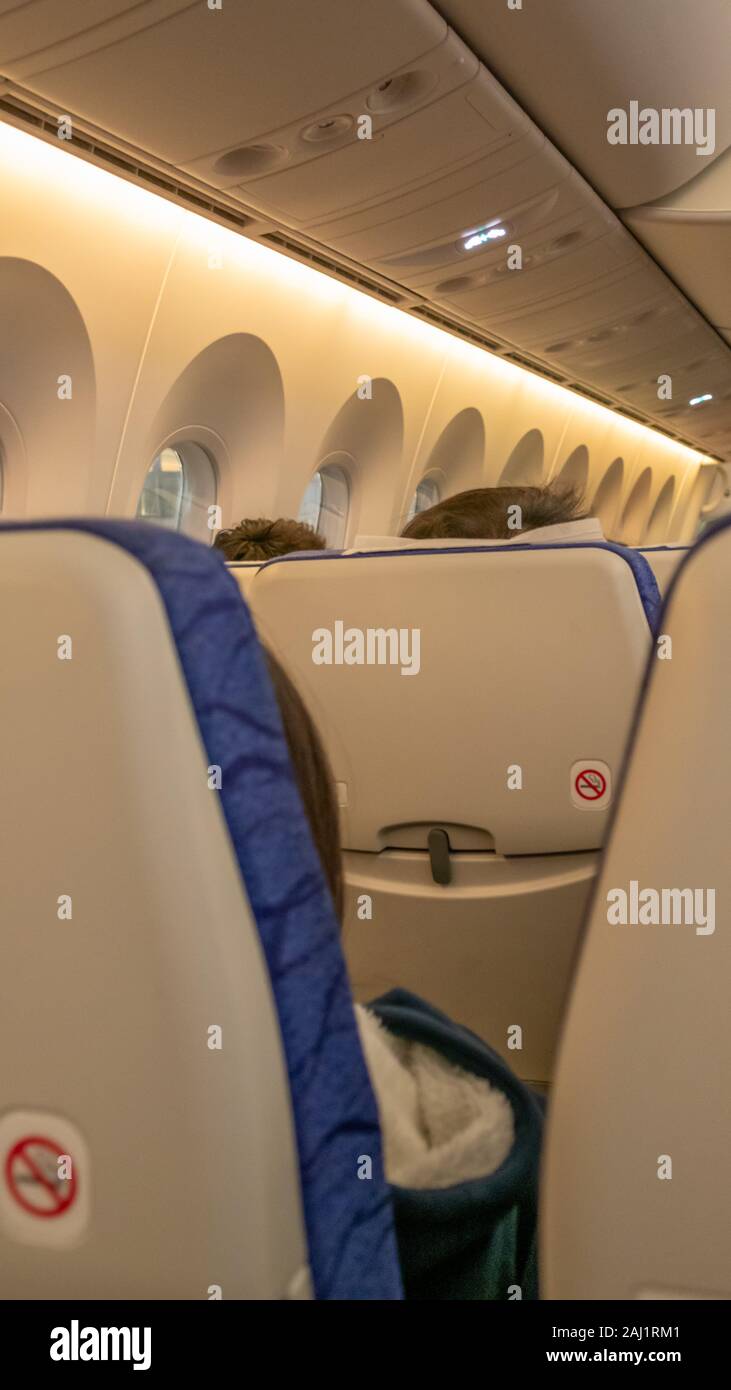 Seating interior of an airplane cabin Stock Photo - Alamy
