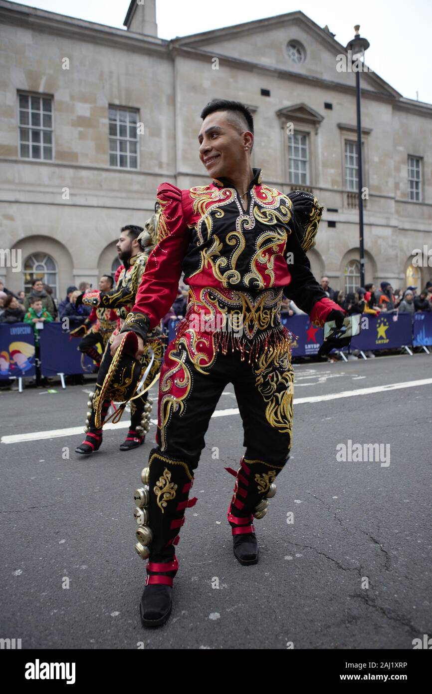London, UK. 01st Jan, 2020. A Bolivian Performer in a traditional costume takes part during the ...