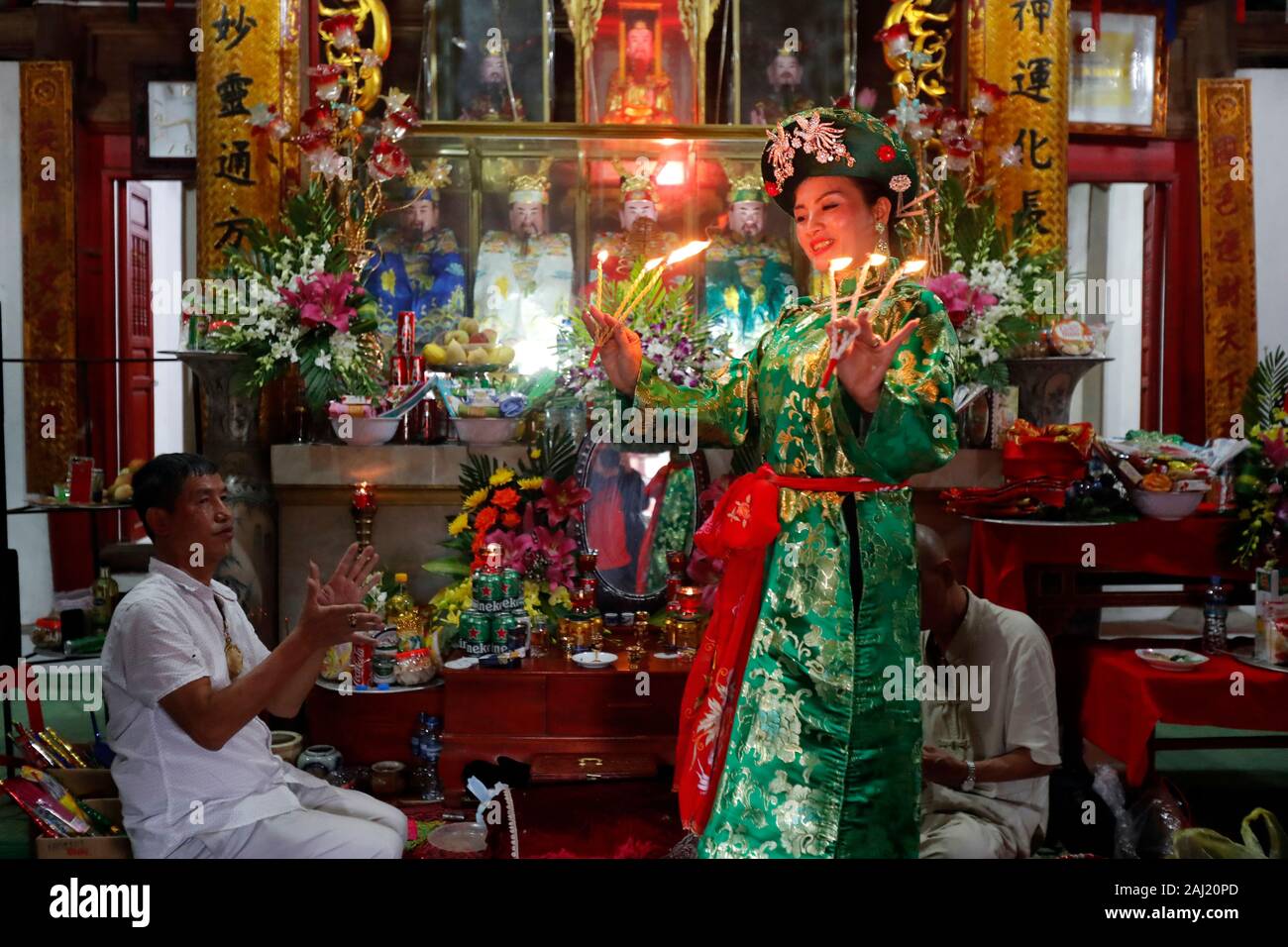 Mau Son Taoist temple, woman at Taoist ceremony, ritual of offerings ...