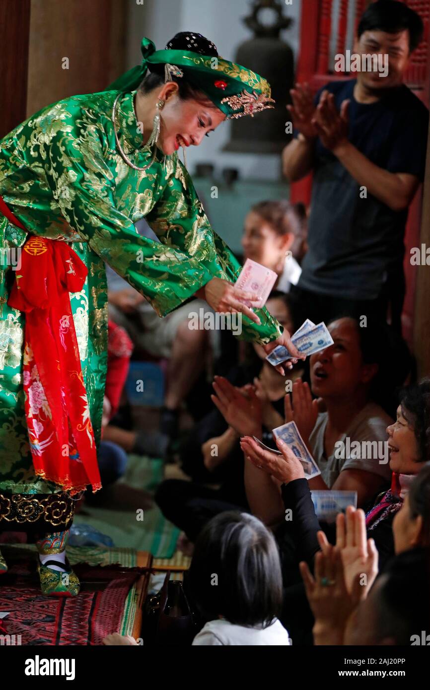 Mau Son Taoist temple, woman at Taoist ceremony, ritual of offerings ...