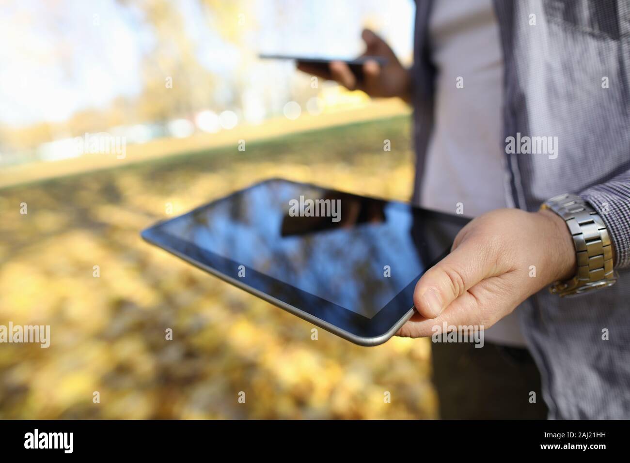 Compact pc and mobile phone Stock Photo - Alamy