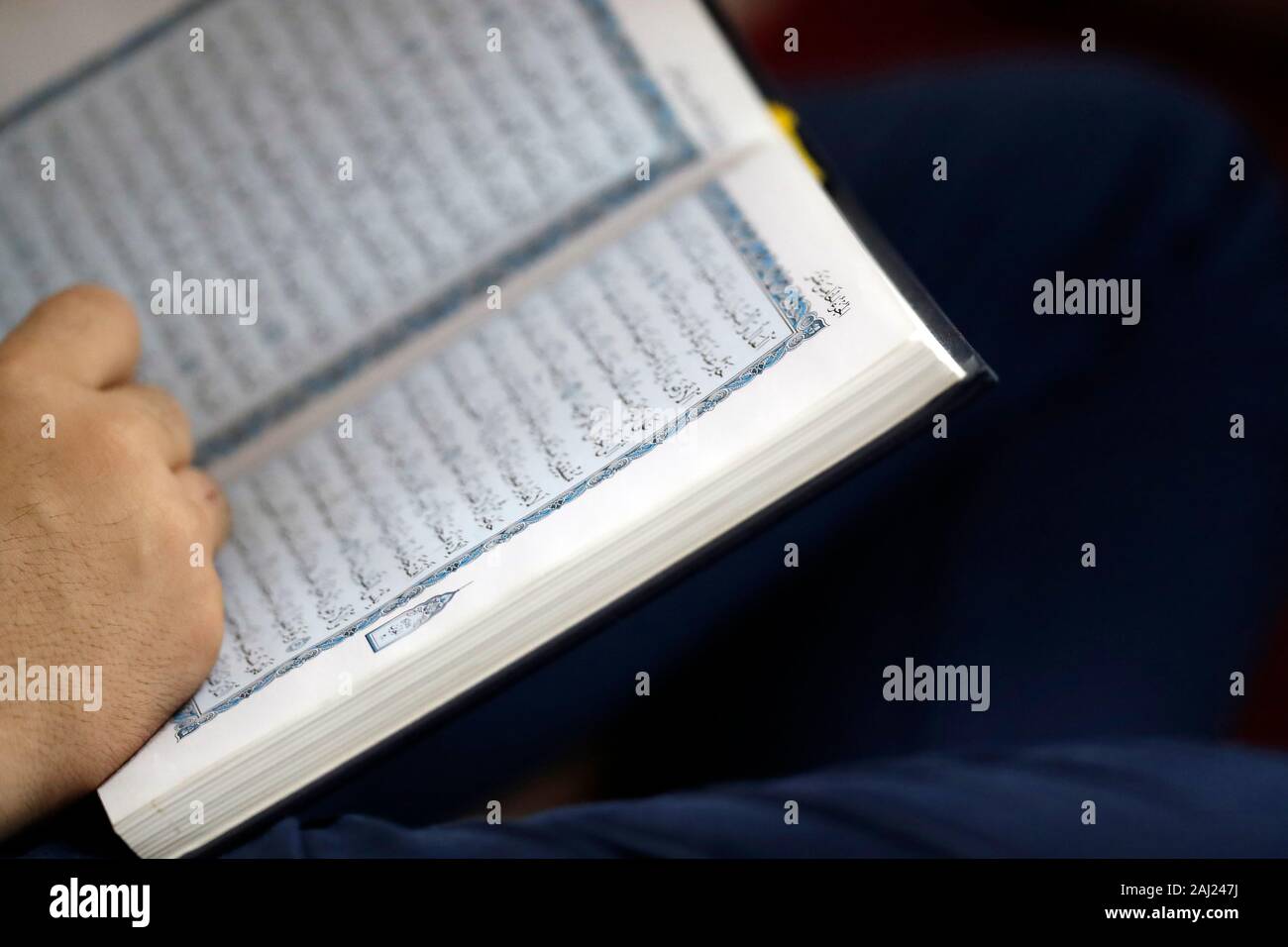 Hand Quran Reading High Resolution Stock Photography and Images - Alamy