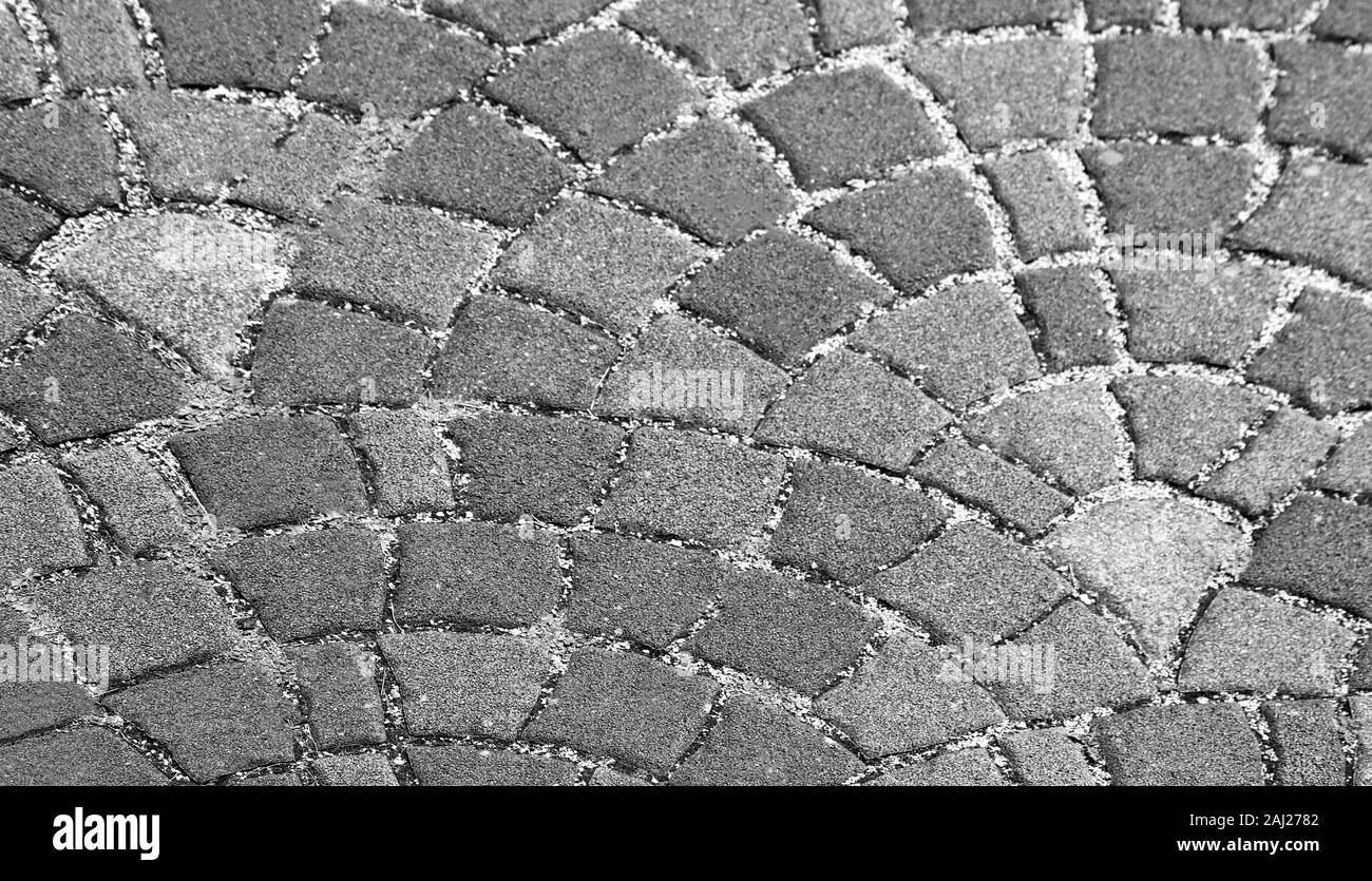 Cobblestone arched pavement road. Top view. Close up Stock Photo - Alamy