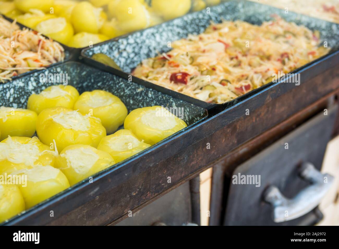 All sorts of pickled vegetables on display at a street food market ...