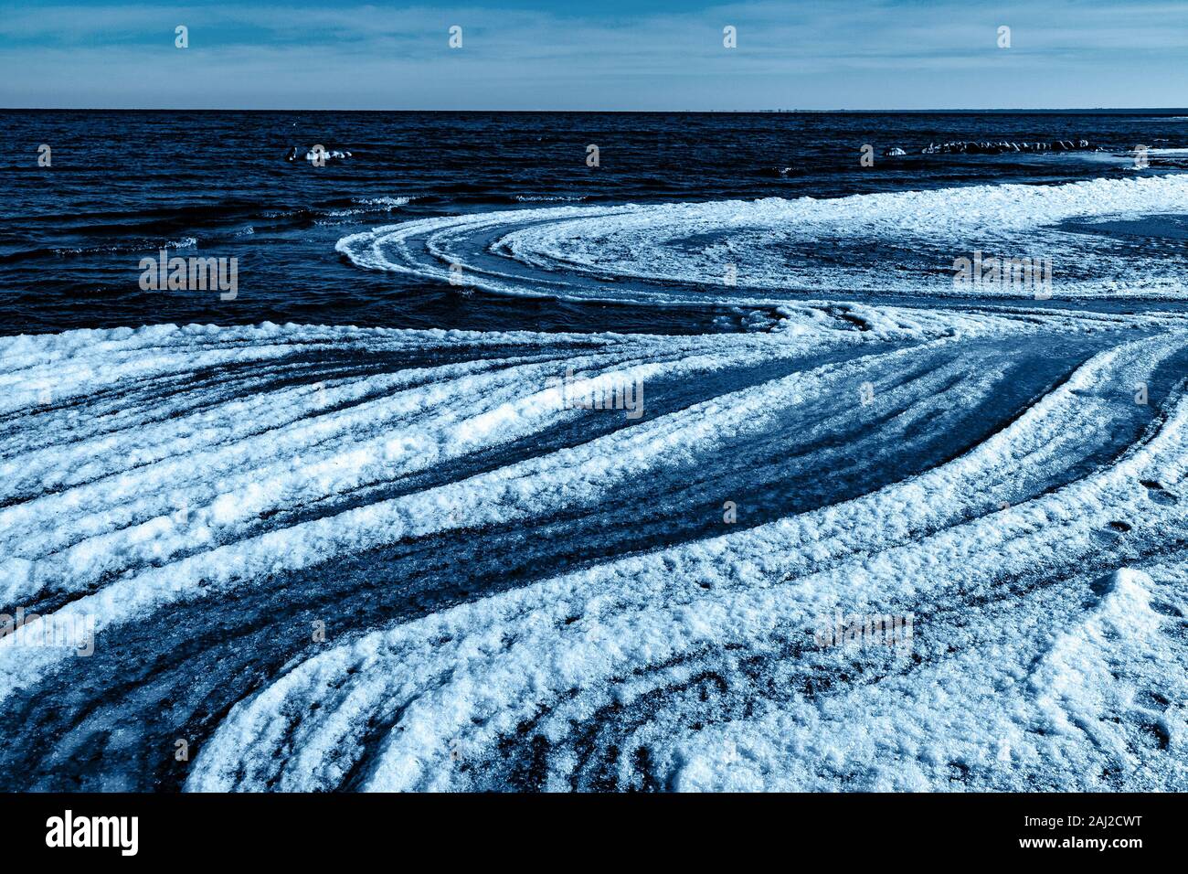 Ice on water surface in early winter Stock Photo - Alamy