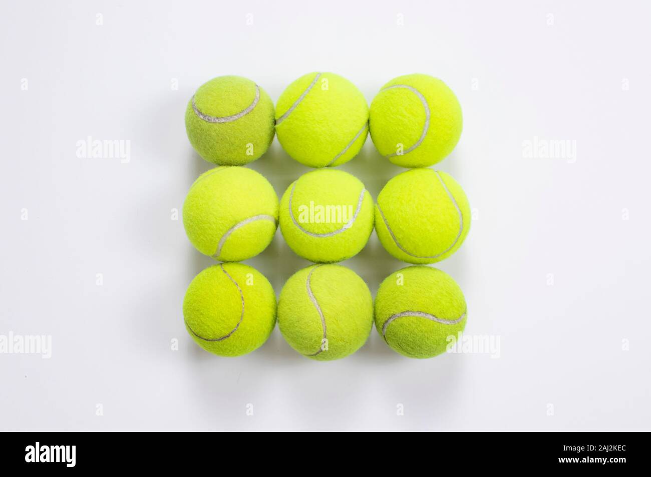 Tennis balls isolated background. Top view Stock Photo - Alamy