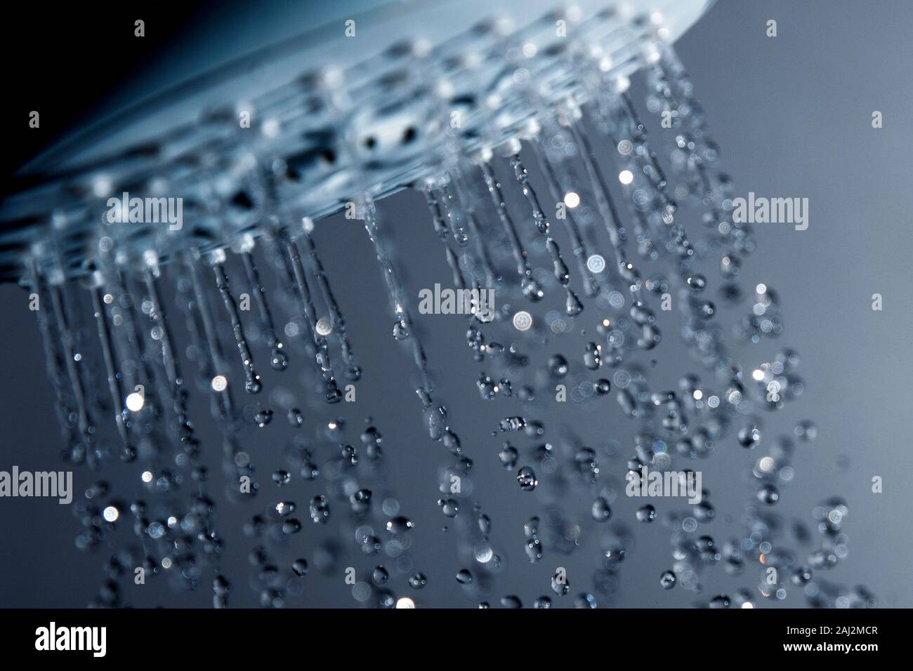 Blue showerhead water drops hi-res stock photography and images - Alamy