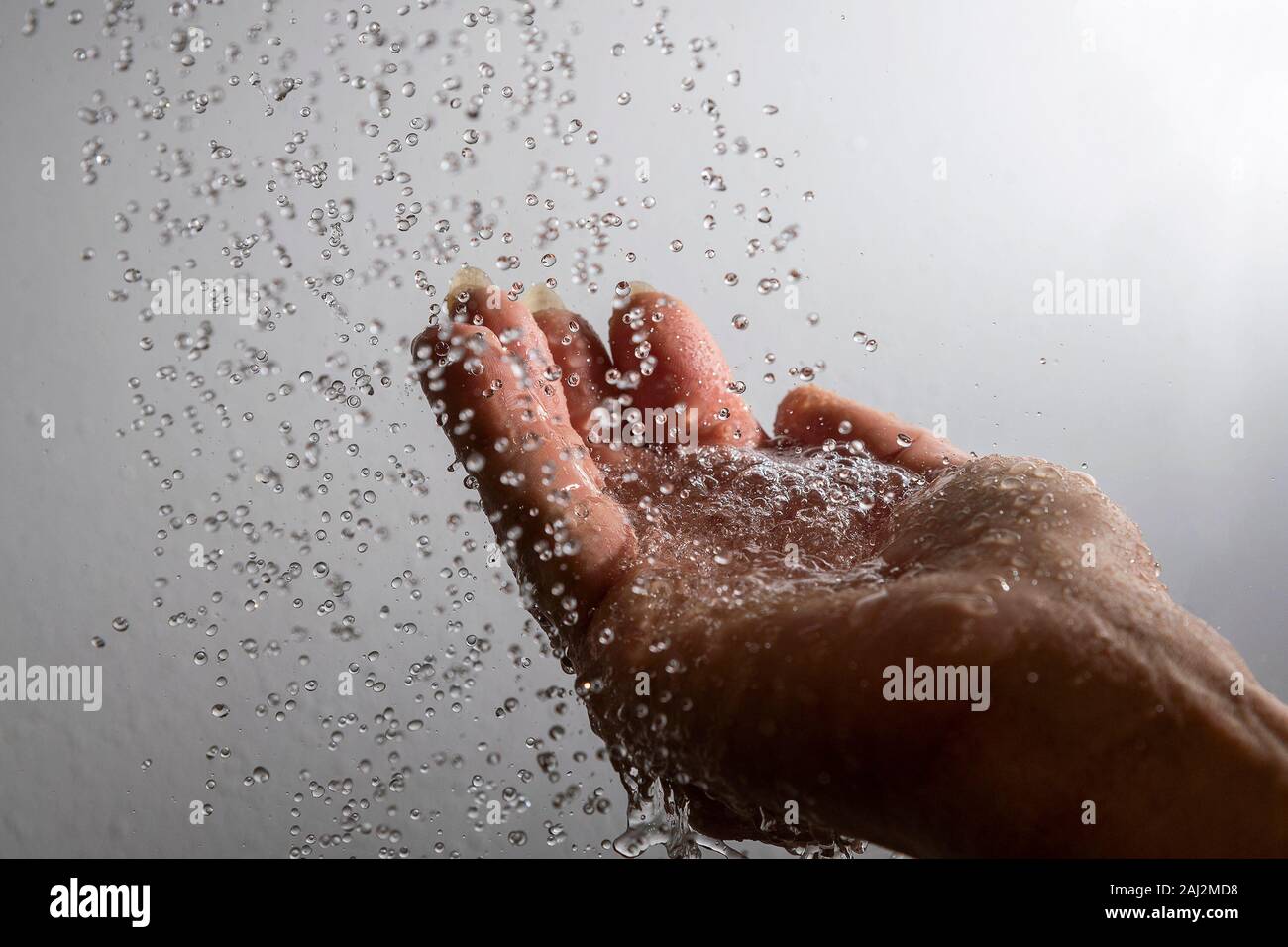 Hand water drops hygiene hi-res stock photography and images - Alamy