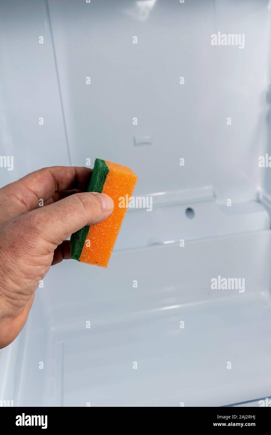 Cleaning hand refrigerator hi-res stock photography and images - Alamy