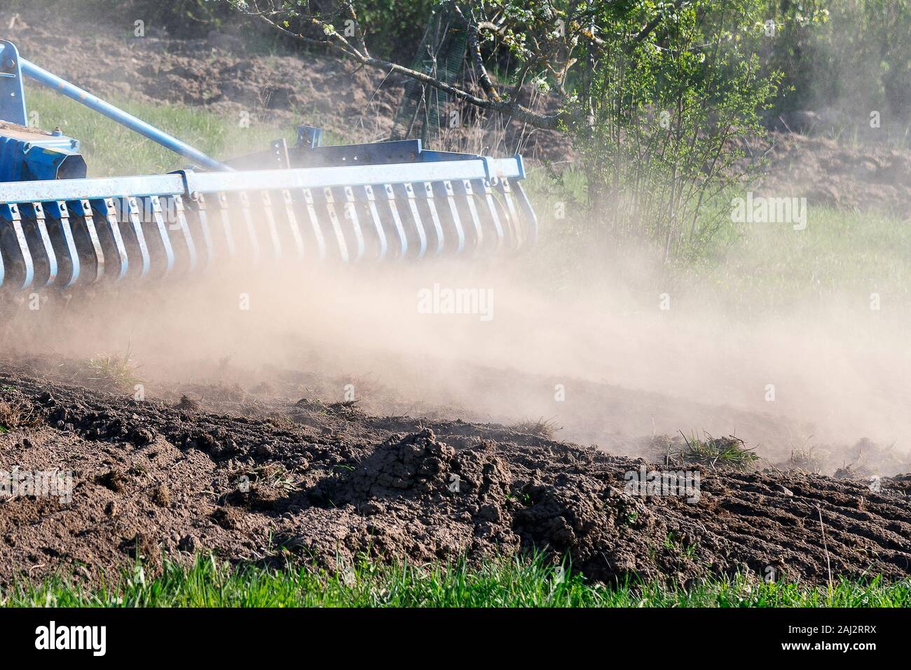 Cultivation of soil in spring time Stock Photo - Alamy