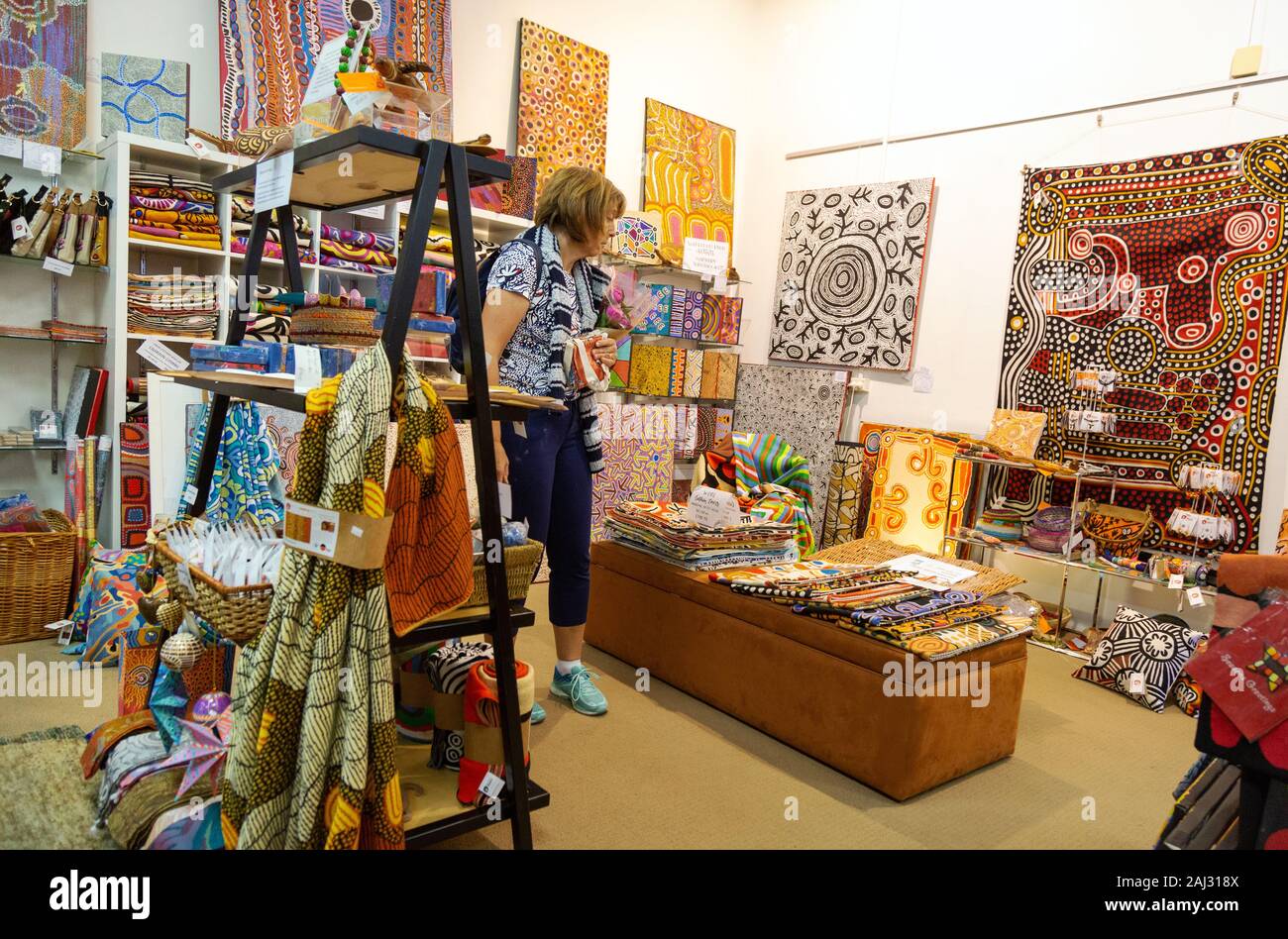 Aboriginal art store - a woman shopping in a shop selling aboriginal ...