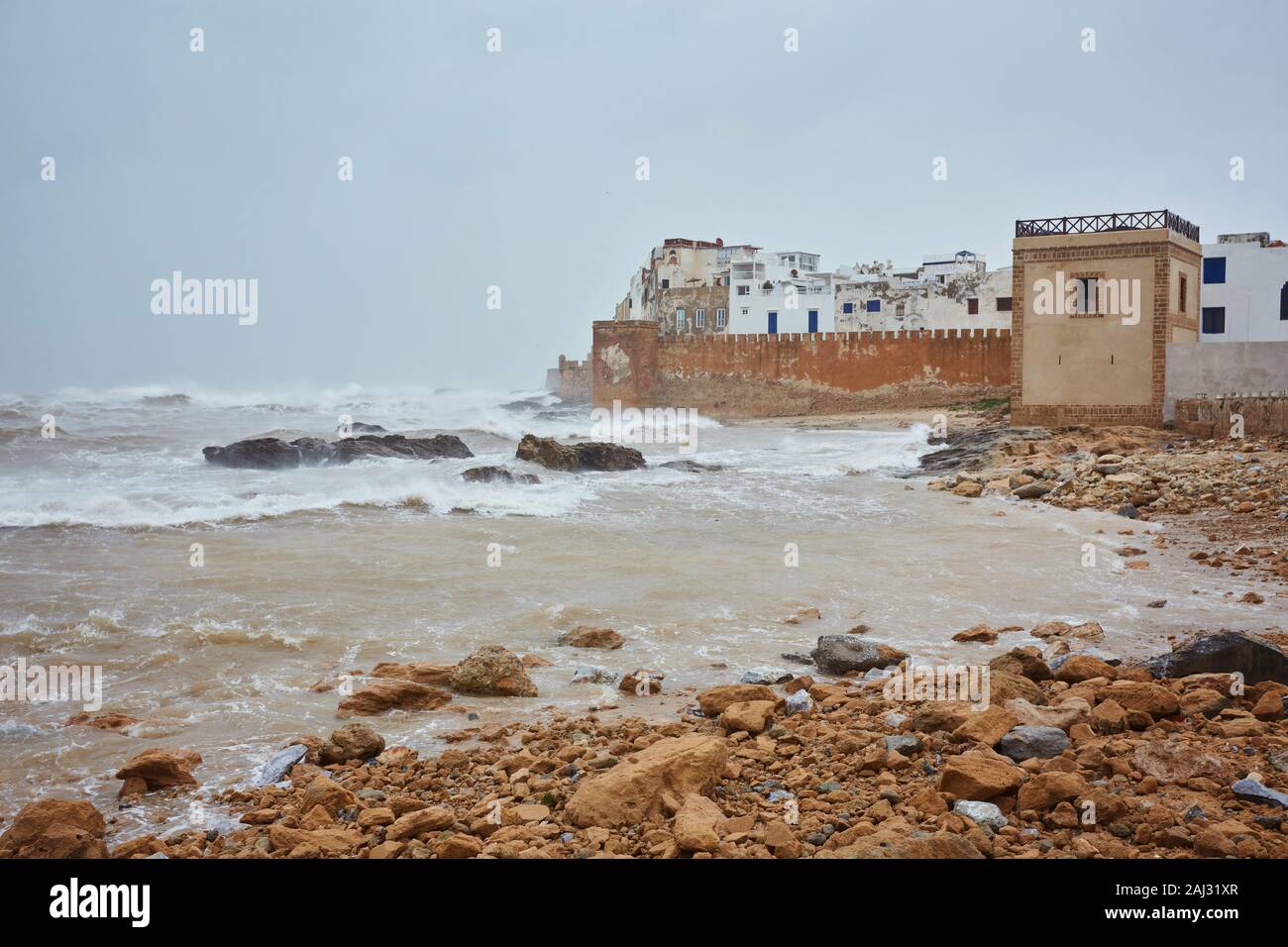 Atlantic ocean waves under the walls of moroccan city of Essaouira with ...
