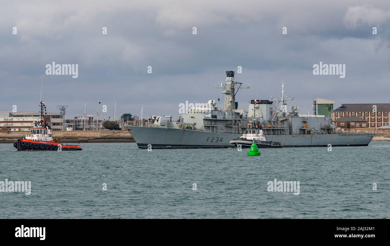 The British Royal Navy Type 23 frigate HMS Iron Duke being towed from ...