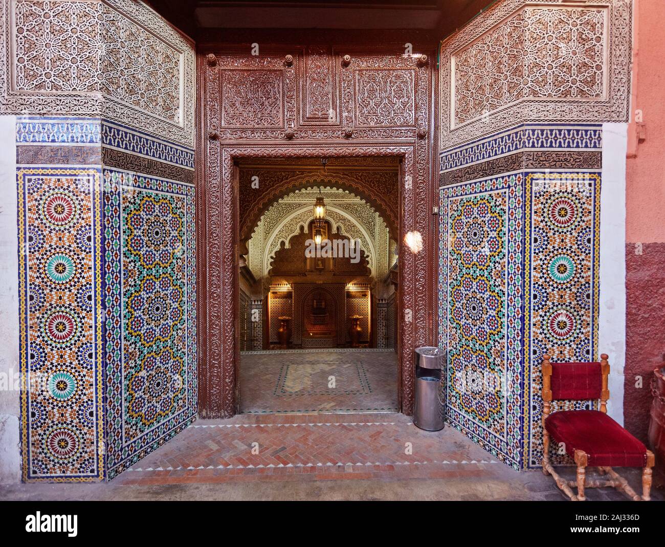 Moroccan painted doors and marble hallway. Location: Interior in ...