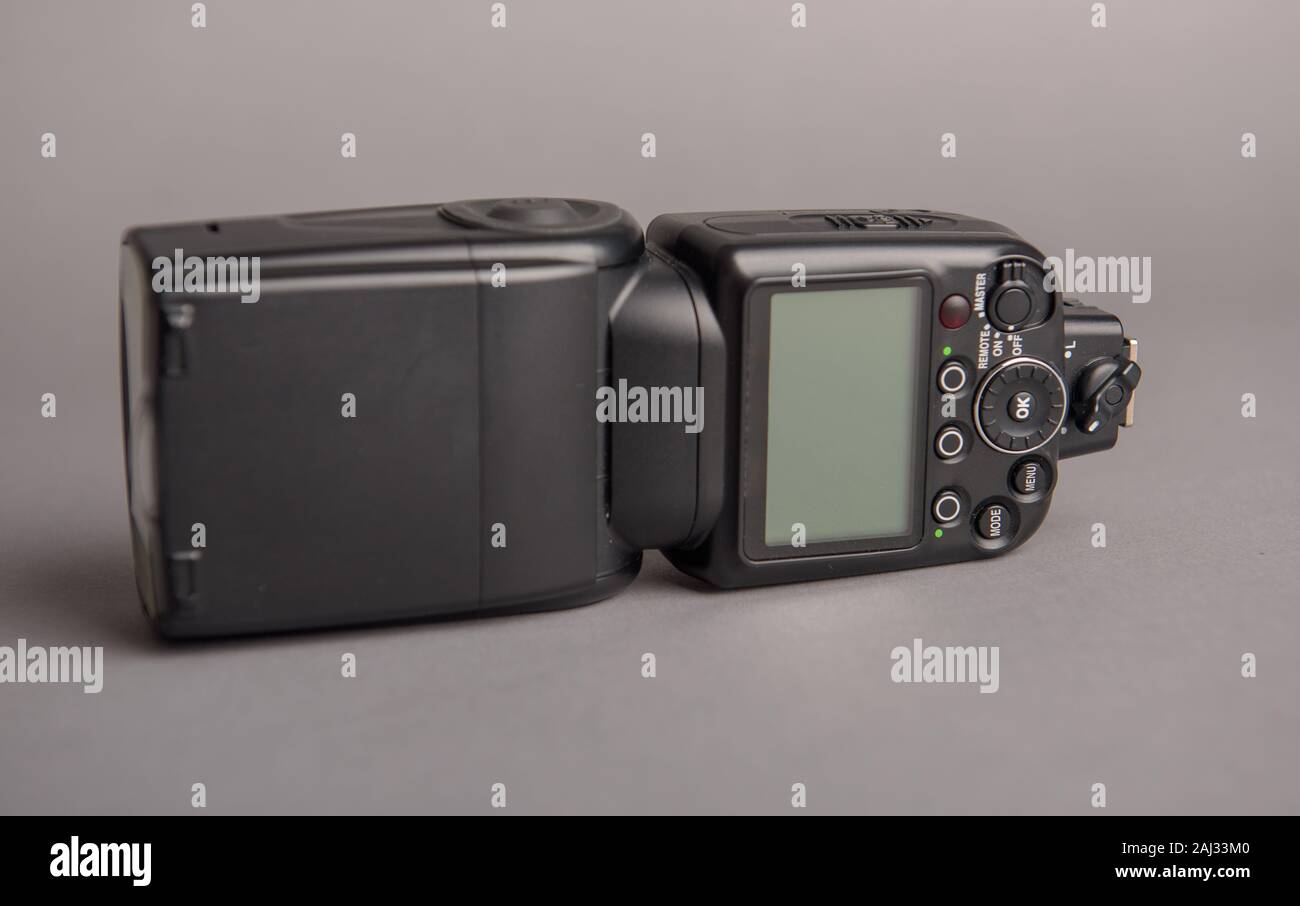 Camera off flash on the gray background. Photography equipment Stock ...