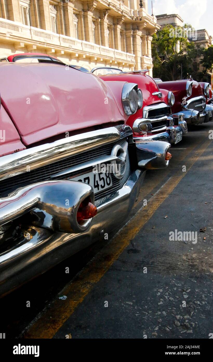 Traditional cars at the central square Parque Central in Havana, Cuba ...