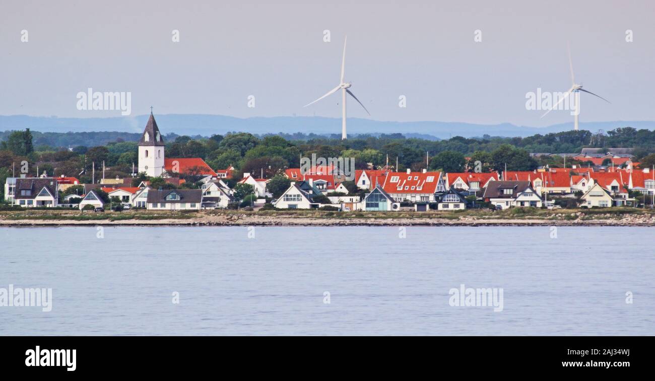 Traditional houses and wind turbines in Viken,Sweden.Viken is situated ...