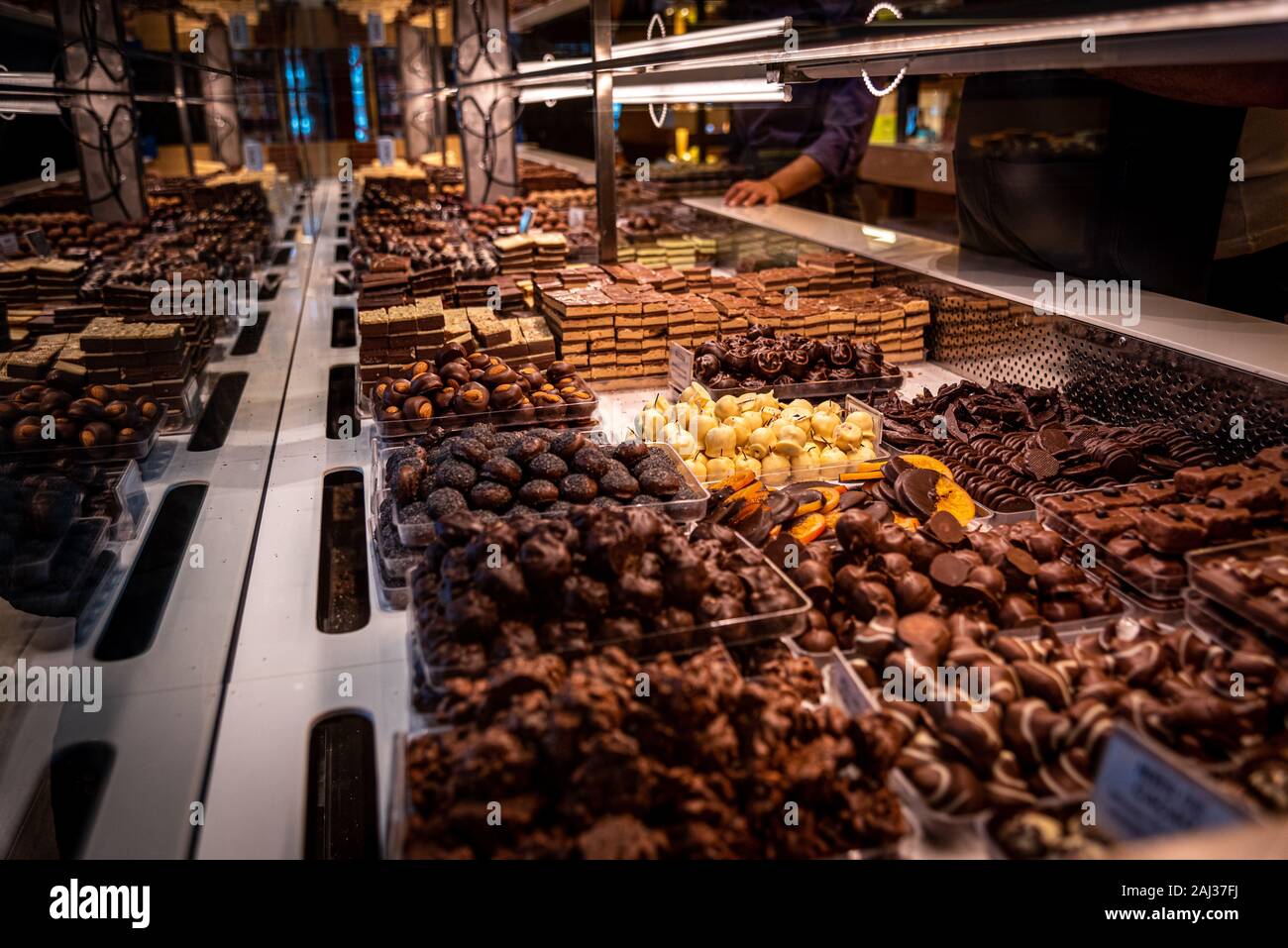 Counter with a lot of variety chocolate and pralines to sell Stock ...