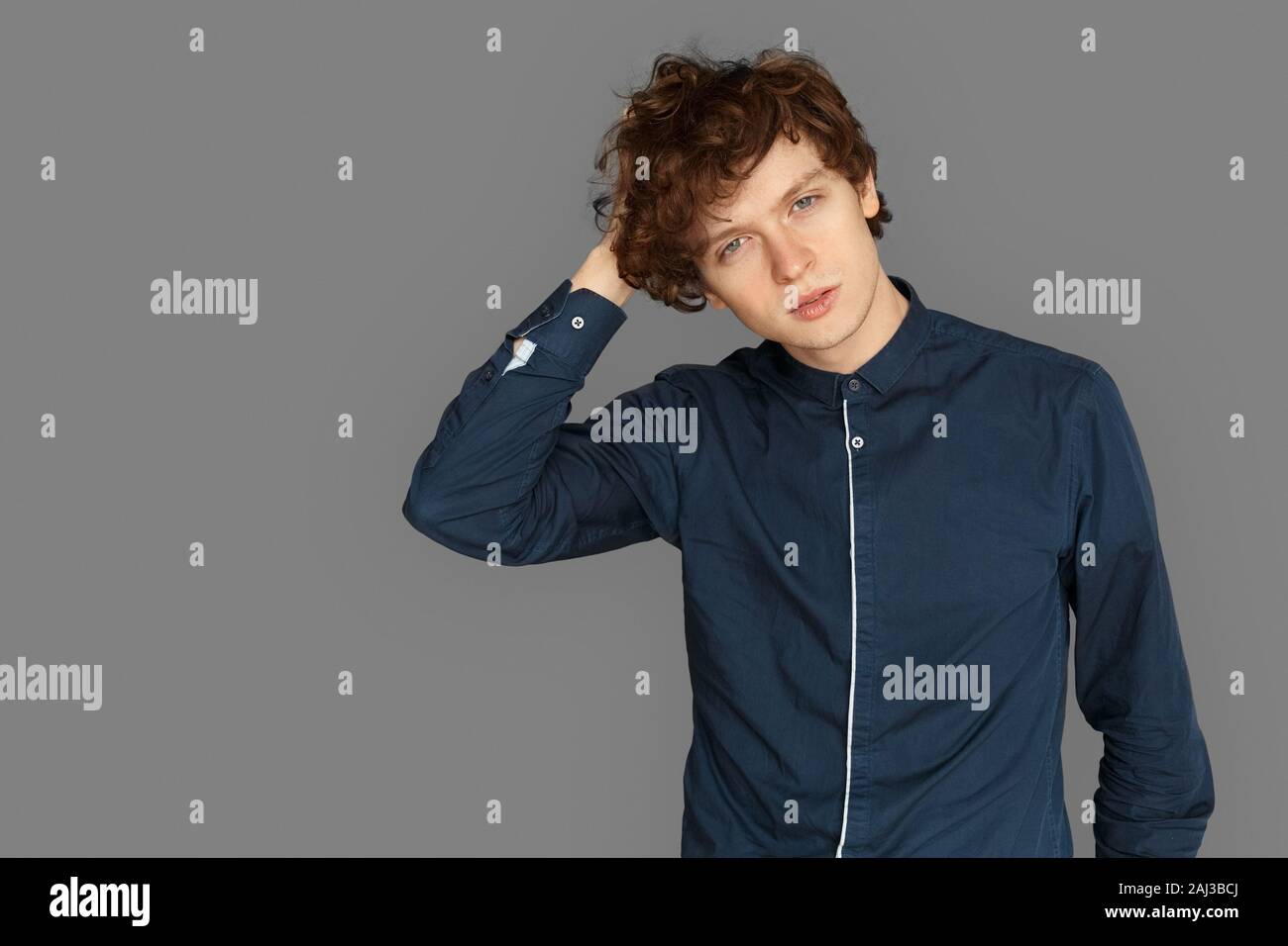 Student scratching head teenager hi-res stock photography and images ...