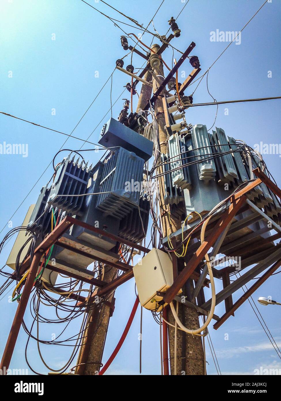 Chaotic electric wires in village Boks in Albania Stock Photo - Alamy
