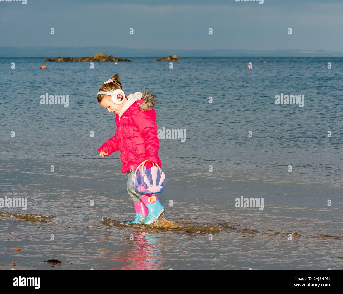 Child in wellies hi-res stock photography and images - Alamy