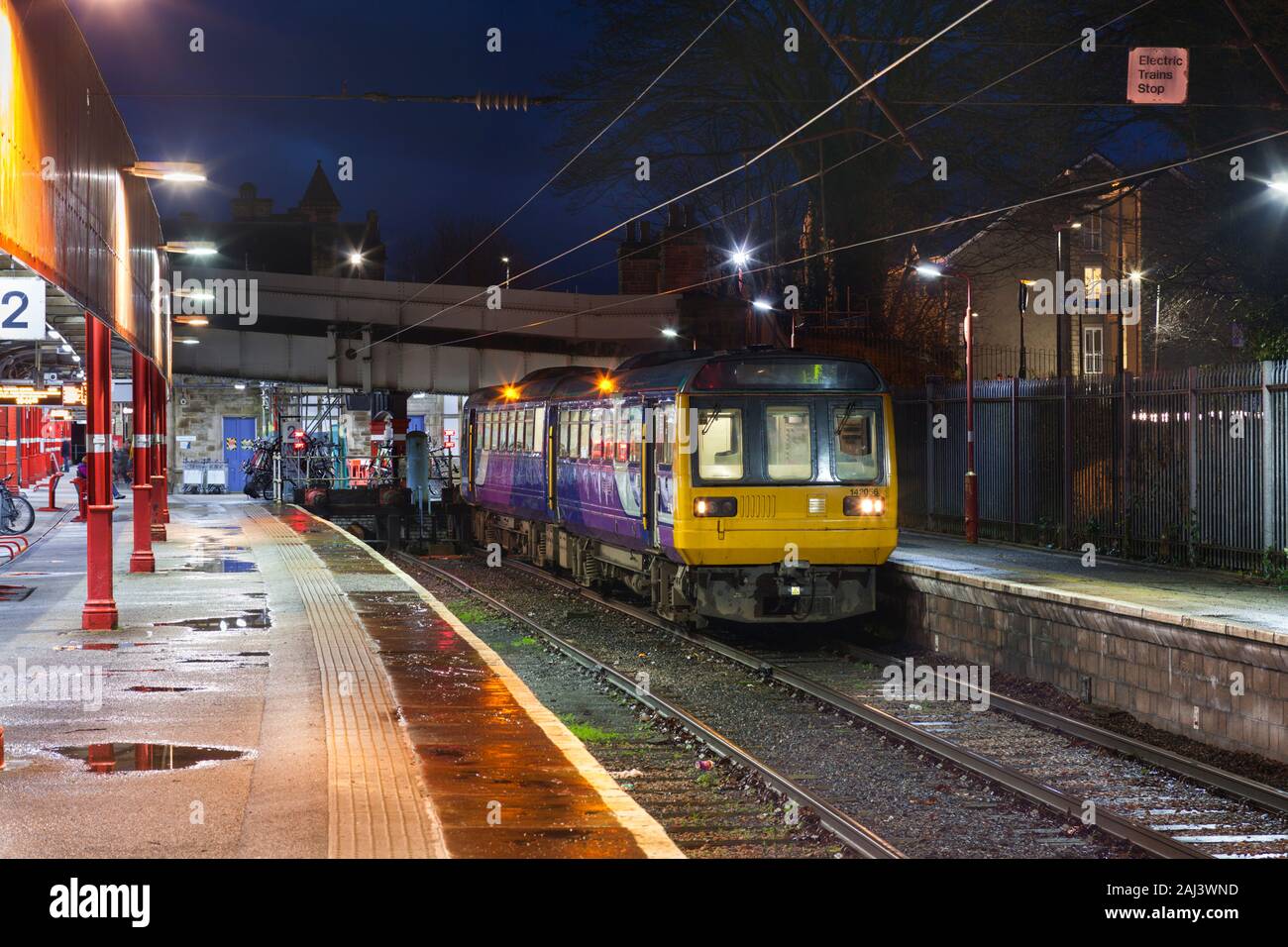Arriva Northern rail class 142 pacer train 142056 at Lancaster railway station with a Lancaster ...