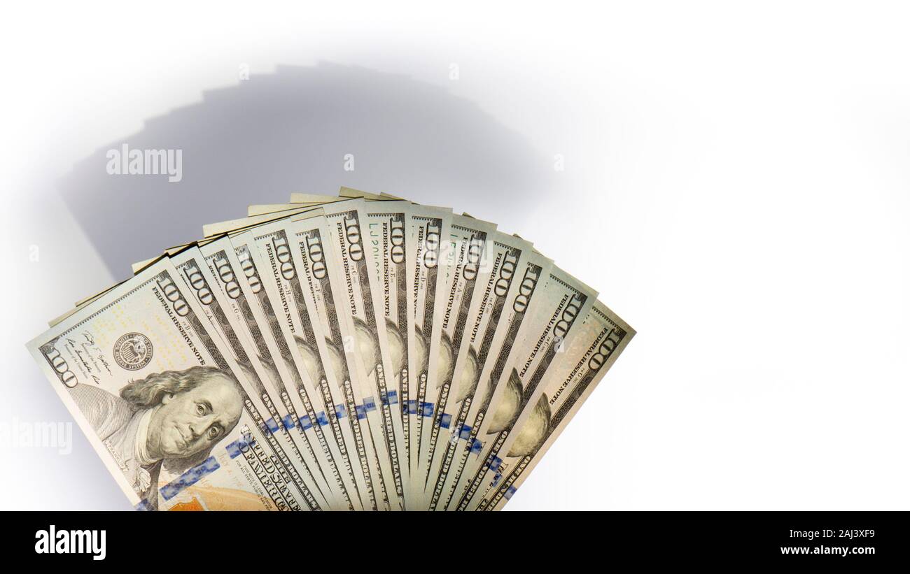 100 dollar banknote in hand shadow falling on white background Stock ...