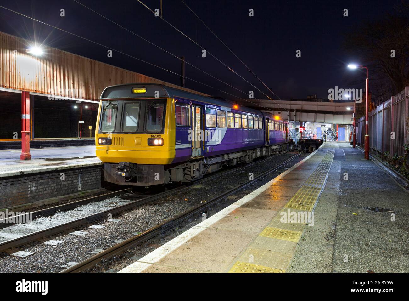 Arriva Northern rail class 142 pacer train 142012 at Lancaster railway station with the1714 ...