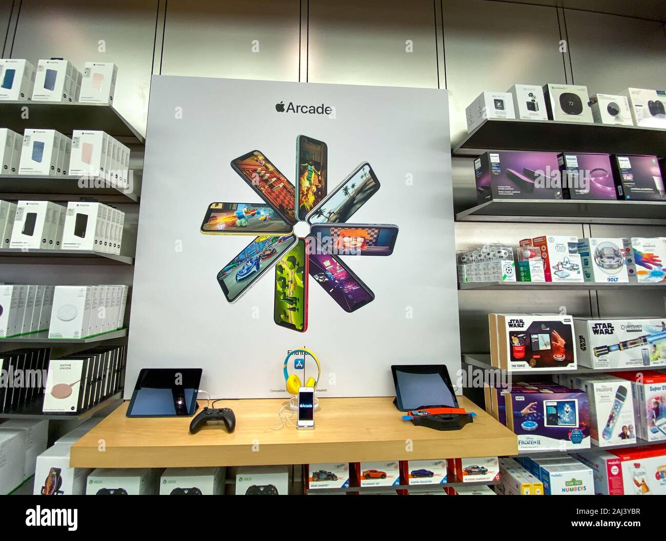 Orlando, FL/USA-12/6/19: An Apple store display with arcade games that ...