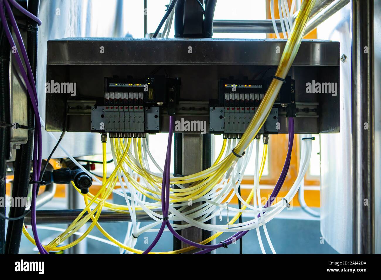 different electrical wires and sensors as part of a brewery piping ...